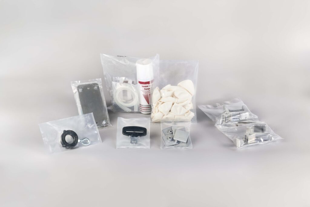 Film sealing unit ISG400 - Willi Kopp Packaging Systems