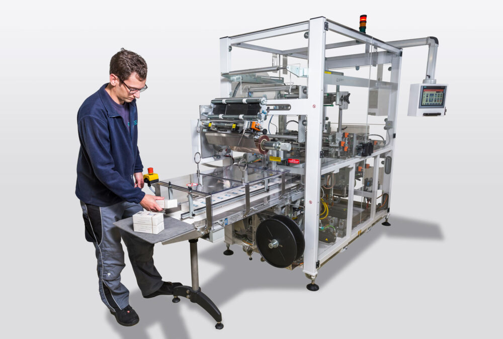 Automatic overwrapper ME TMX - Willi Kopp Packaging Systems